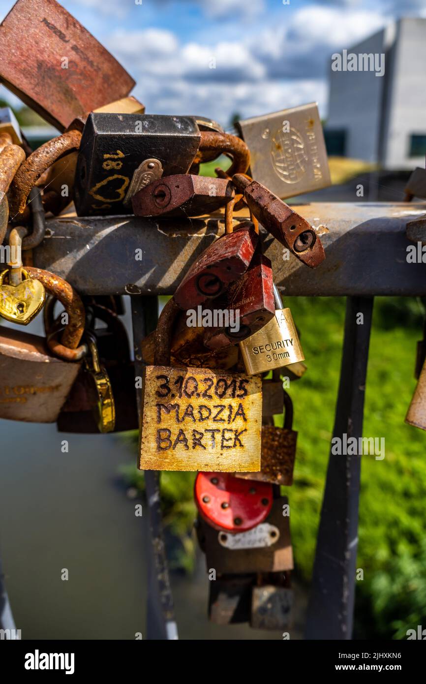 A mix of locks attached to a barrier as a symbol of love on the Jordan ...