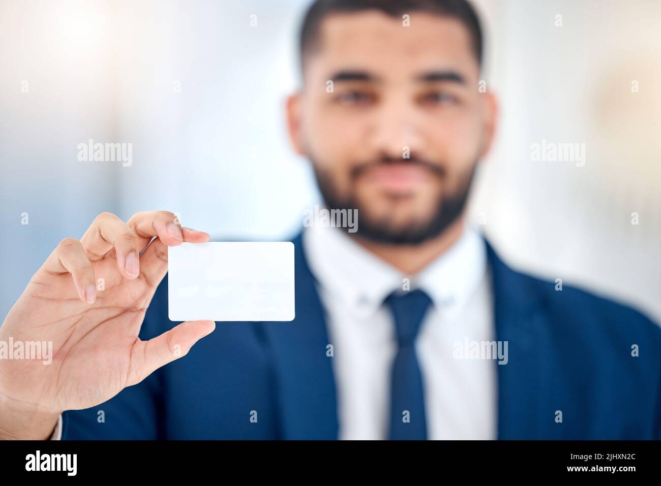 This is all the information you need. a young businessman showing a ...