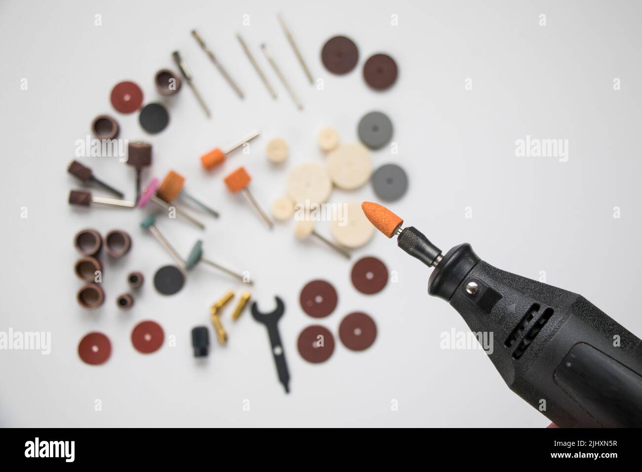 Dremel rotary kit, dremel heads, instrument for handwork on white ...