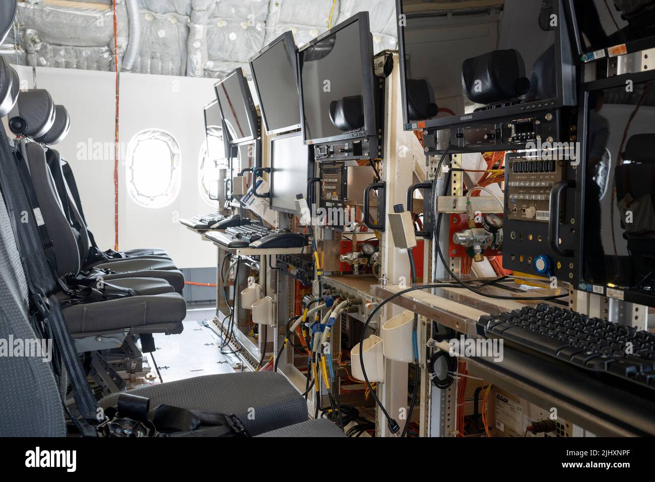 Flight testing equipment in the cabin of a Boeing 777X jet airliner, at ...