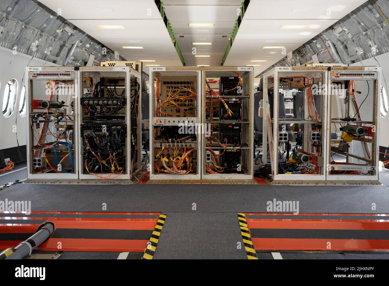 Flight testing equipment in the rear cabin of a Boeing 777X jet ...