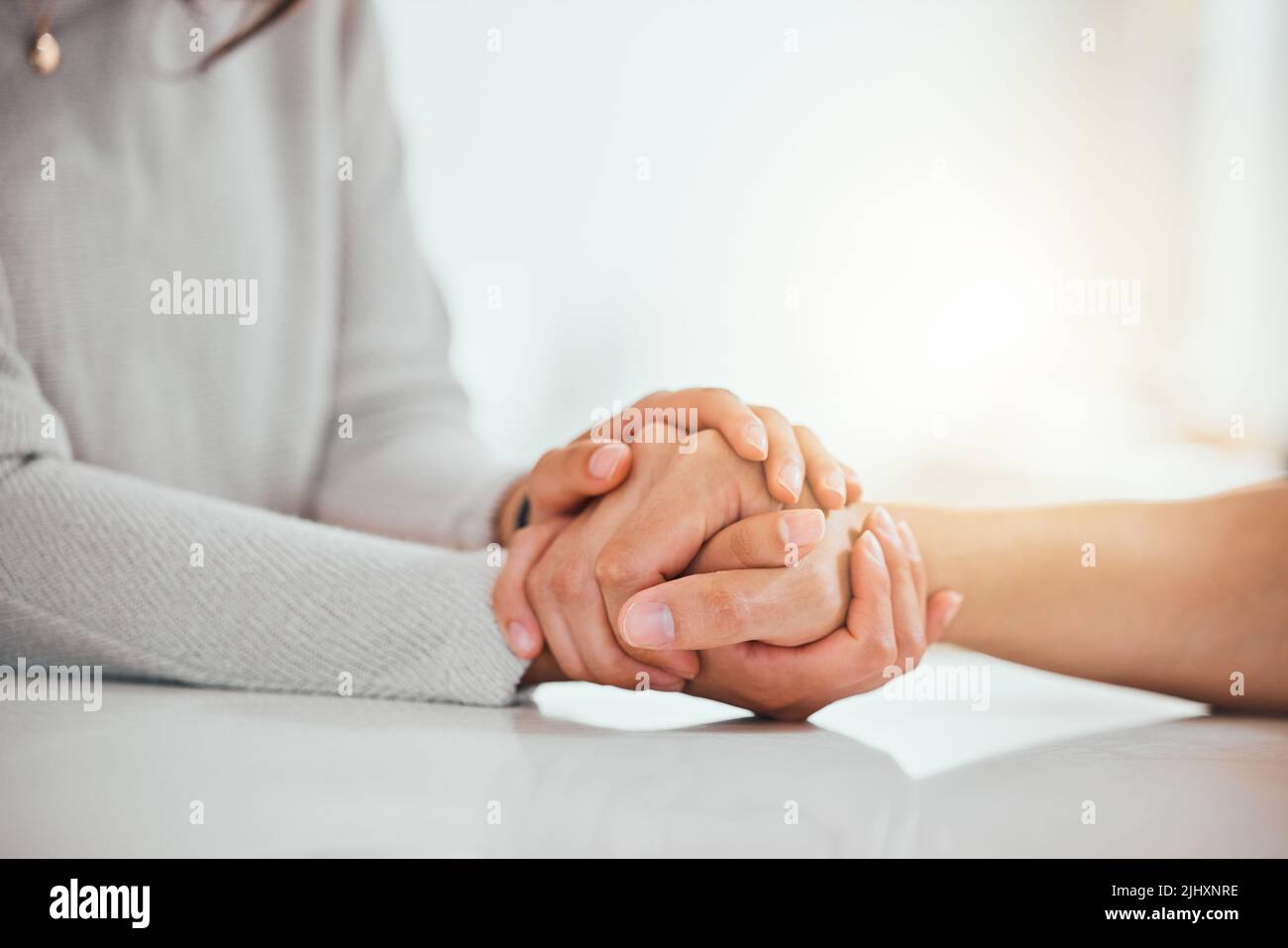 You can rely on me. two unrecognizable people holding hands Stock Photo ...