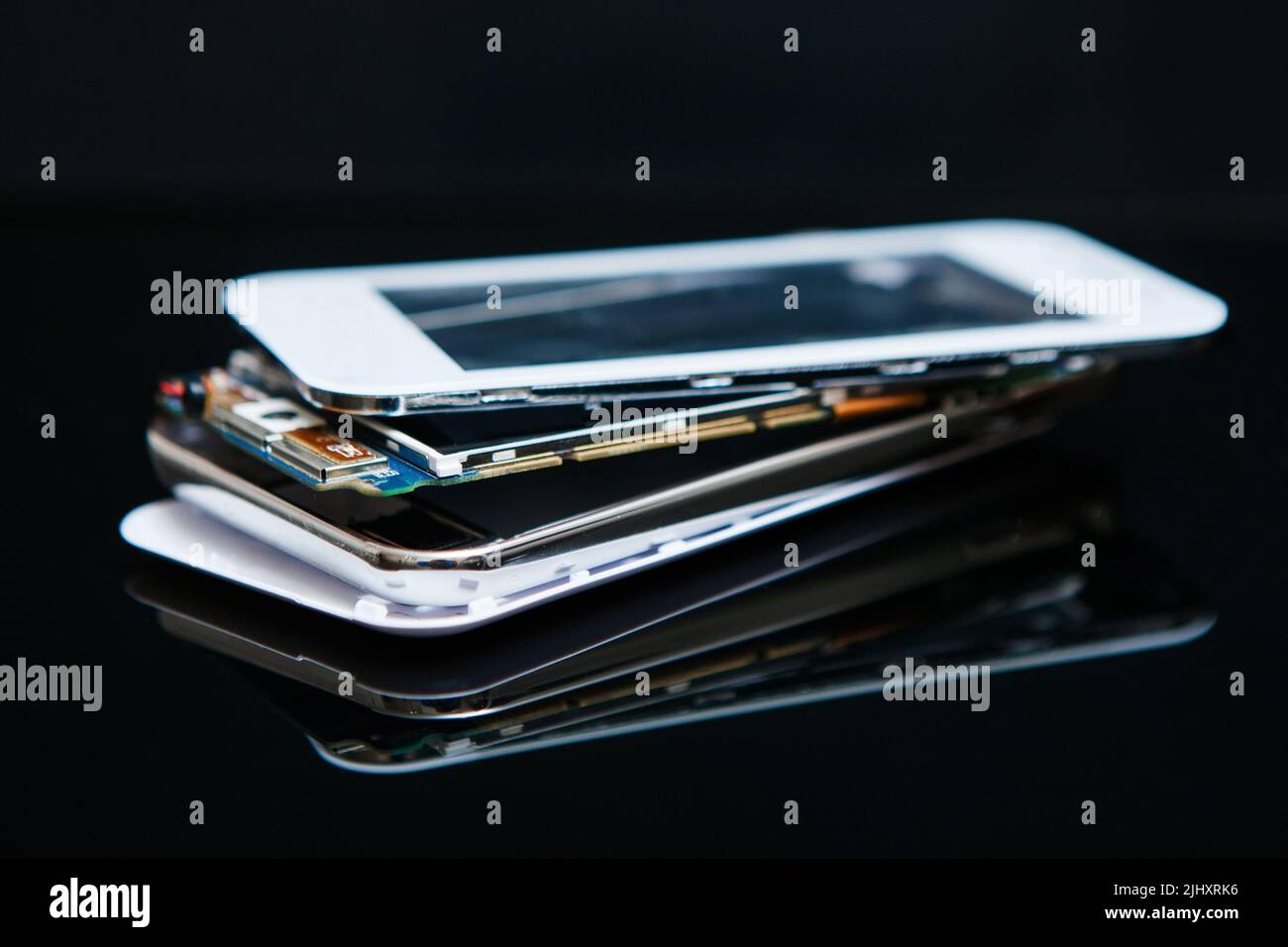 layered smartphone disassembly workshop courses Stock Photo - Alamy