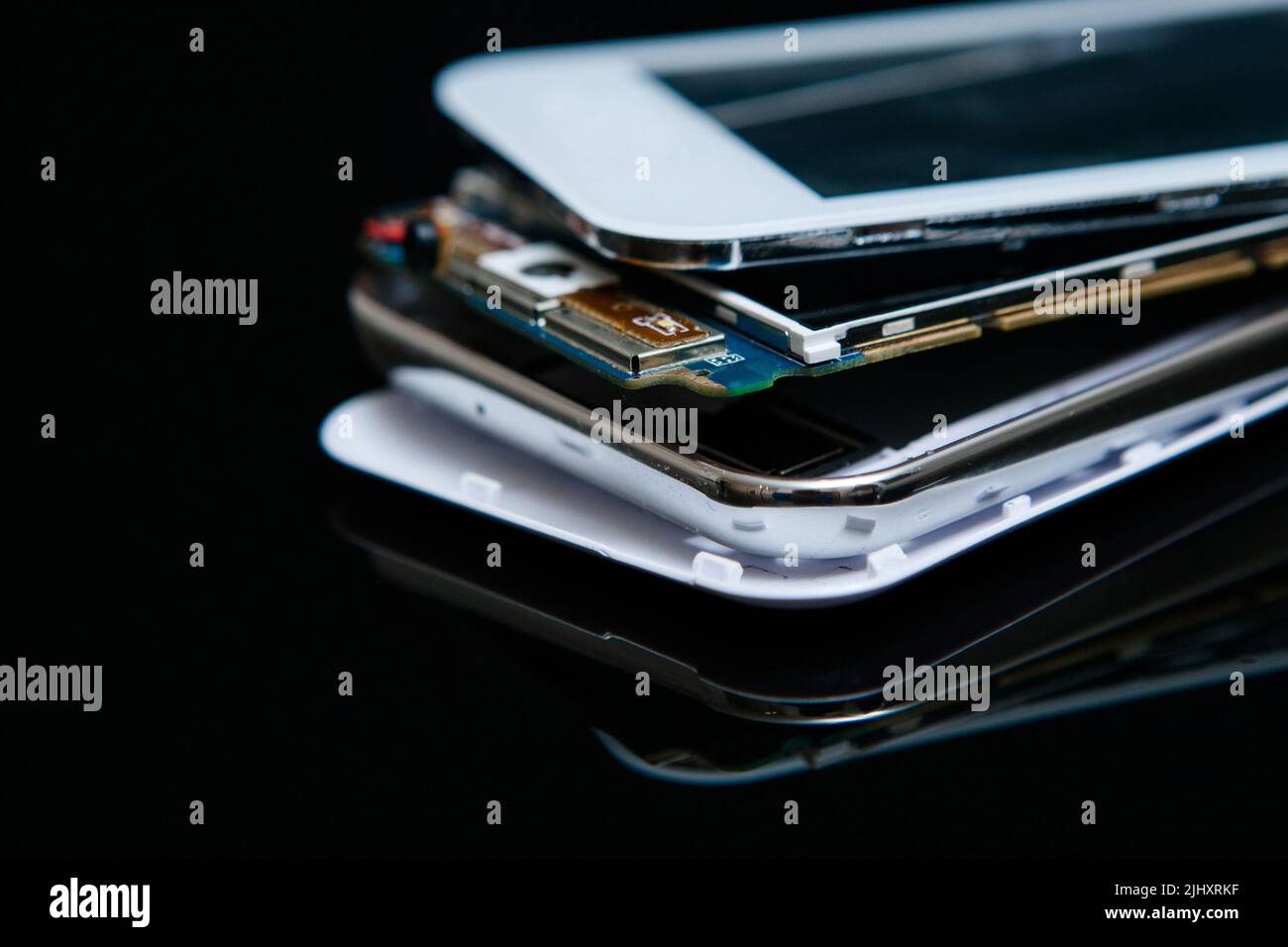layered smartphone disassembly workshop courses Stock Photo - Alamy