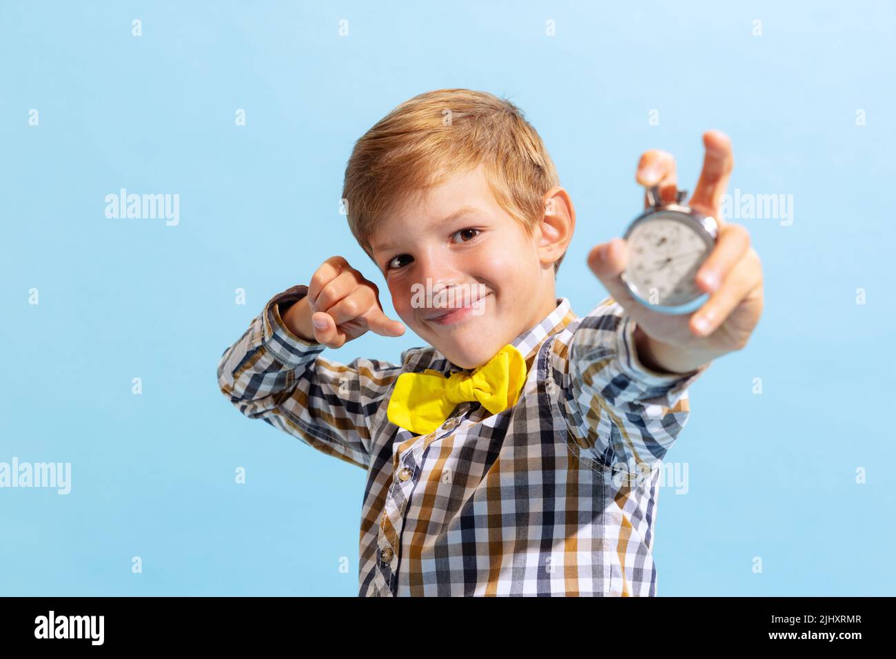 Cute preschool boy, kid wearing retro style outfit isolated on light ...