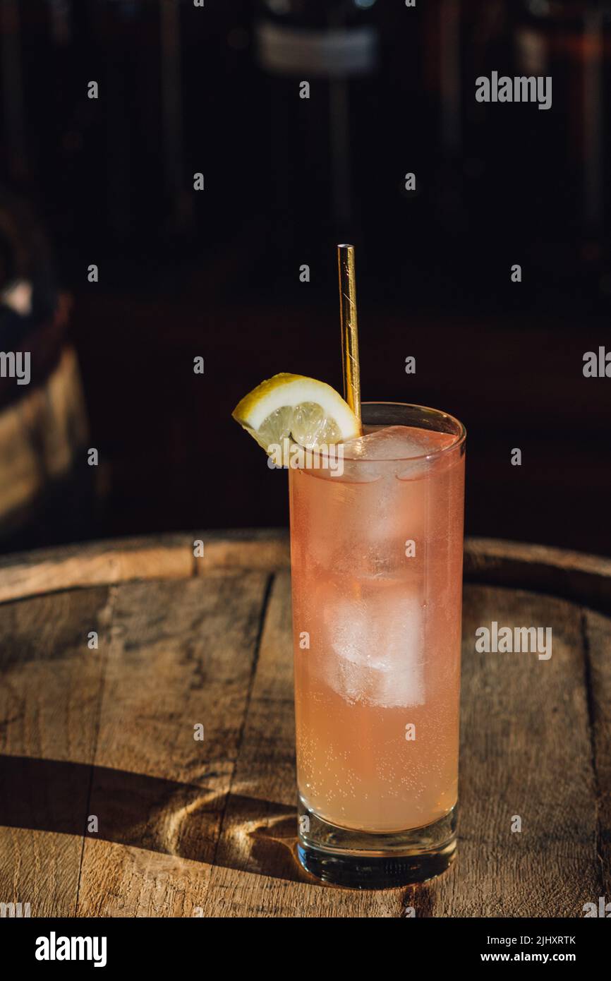 Golden lemon on pink hi-res stock photography and images - Alamy