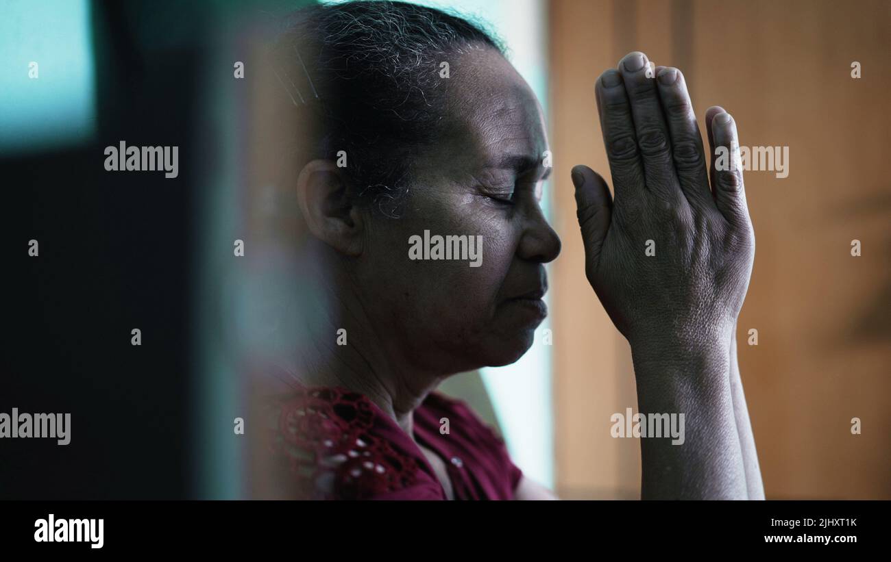 South american woman praying god hi-res stock photography and images ...