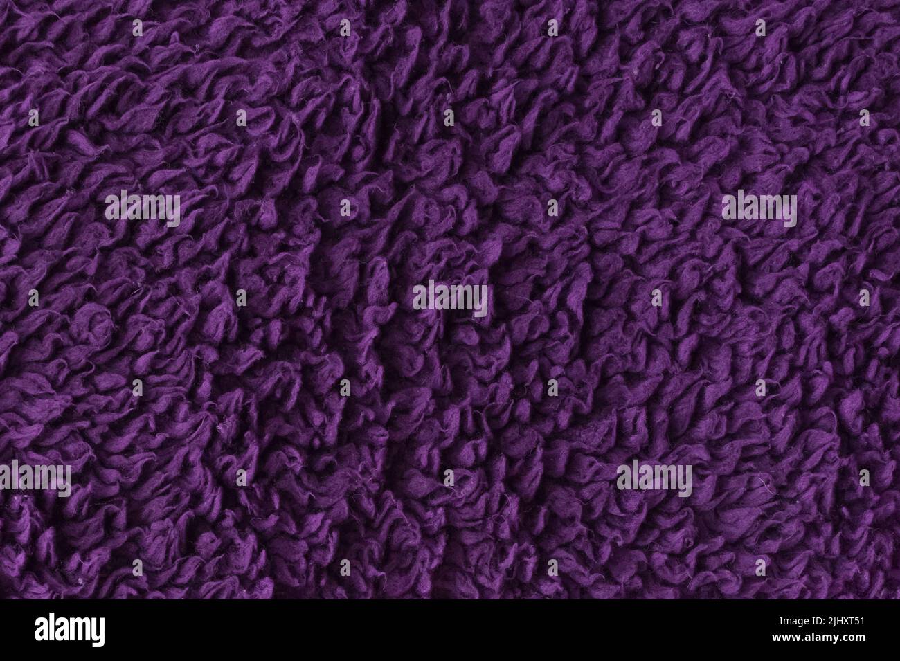 Closeup detail purple carpet texture hi-res stock photography and ...