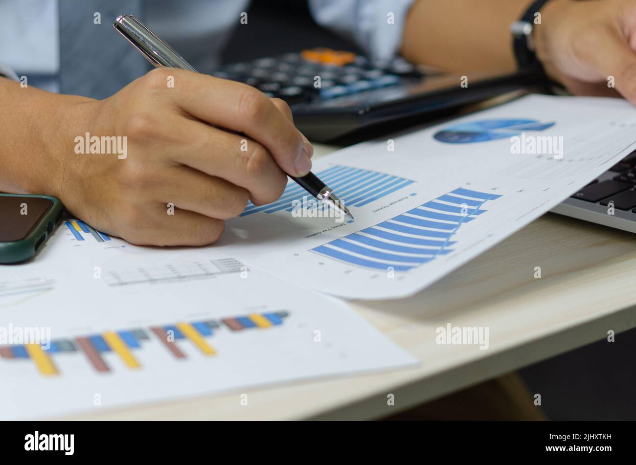 Businessman analyzing charts graphs laptop hi-res stock photography and ...