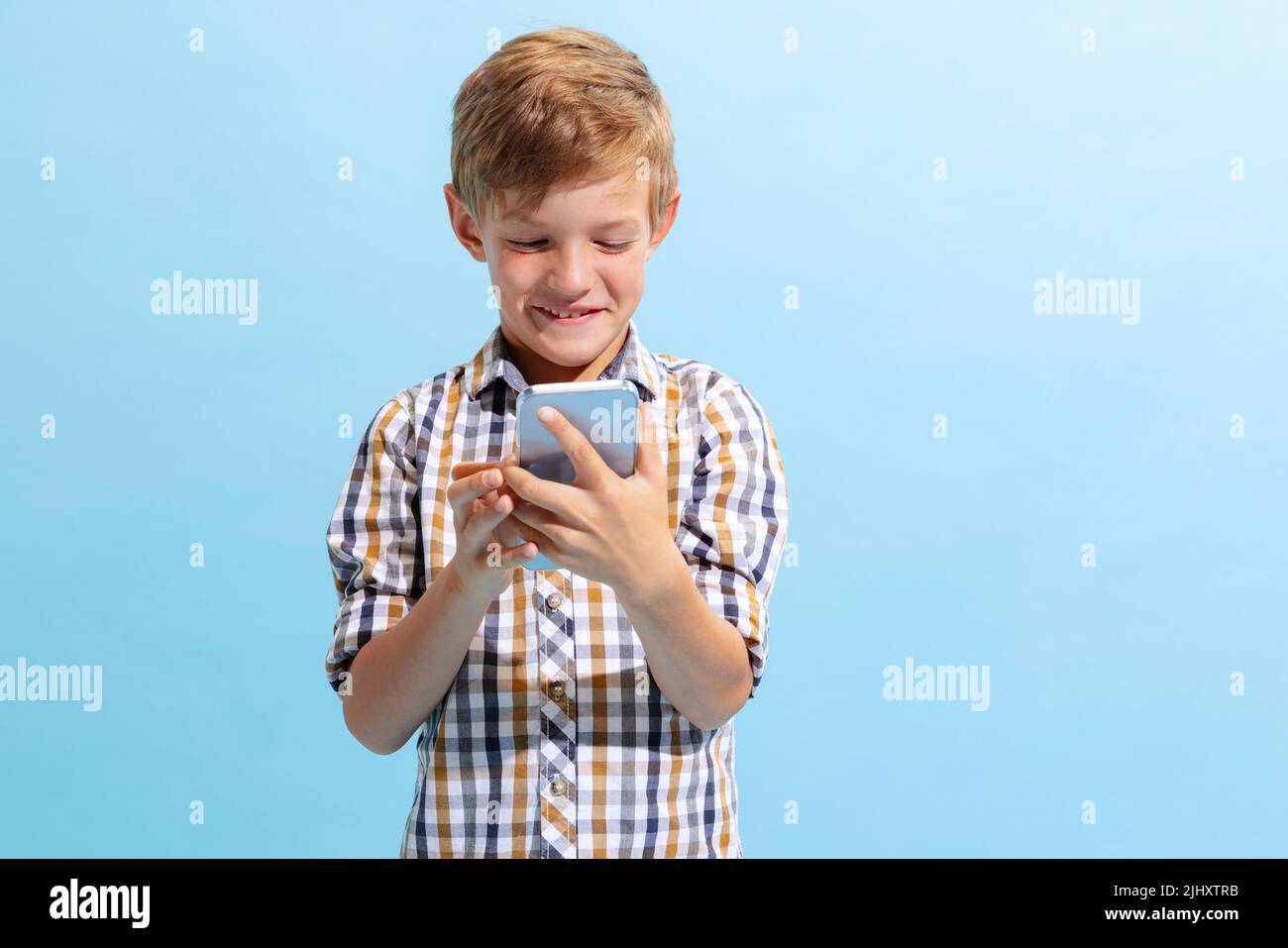 Cute preschool boy, kid wearing retro style outfit isolated on light ...