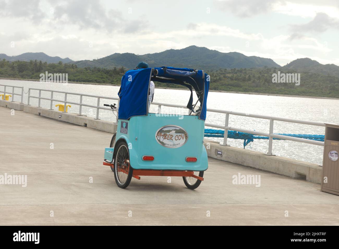 Bicycle rickshaw transferring guests from cruise ship terminal complex ...
