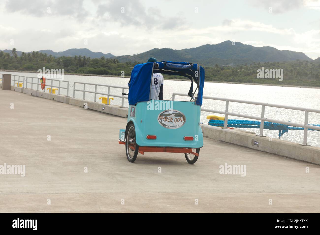 Bicycle rickshaw transferring guests from cruise ship terminal complex ...