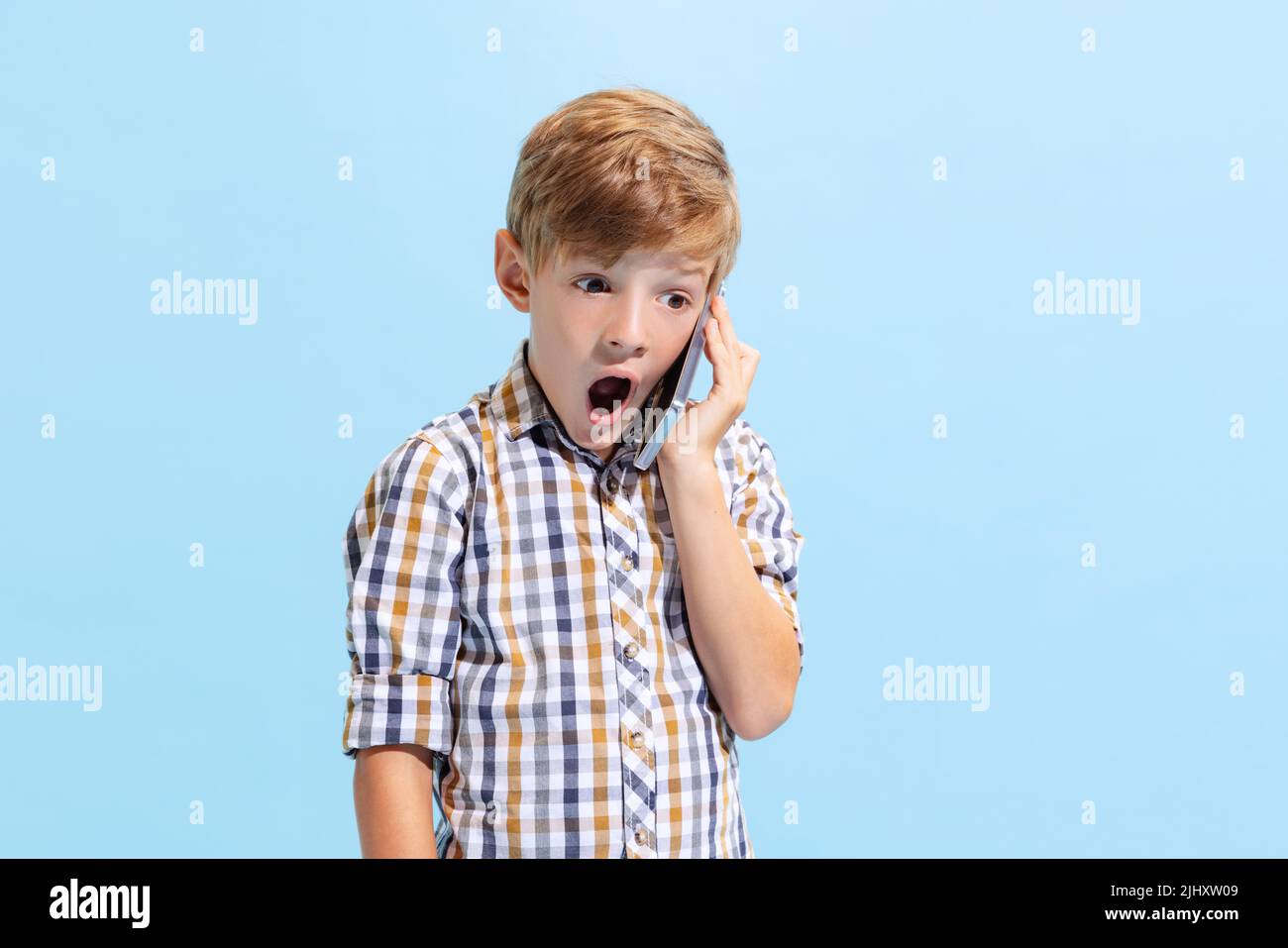 Cute preschool boy, kid wearing retro style outfit isolated on light ...