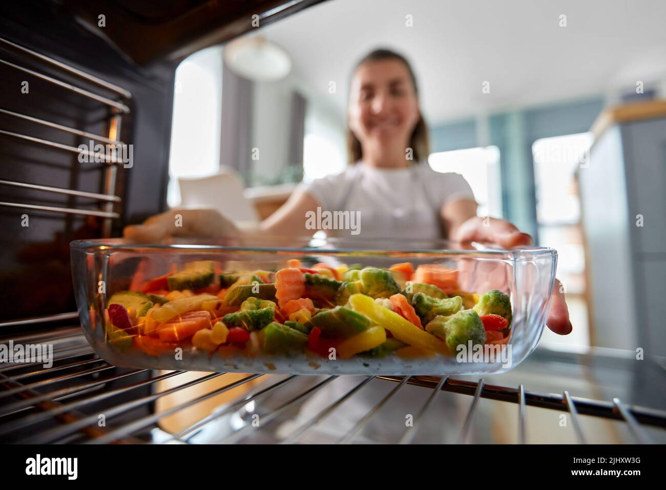 Food in oven hi-res stock photography and images - Alamy