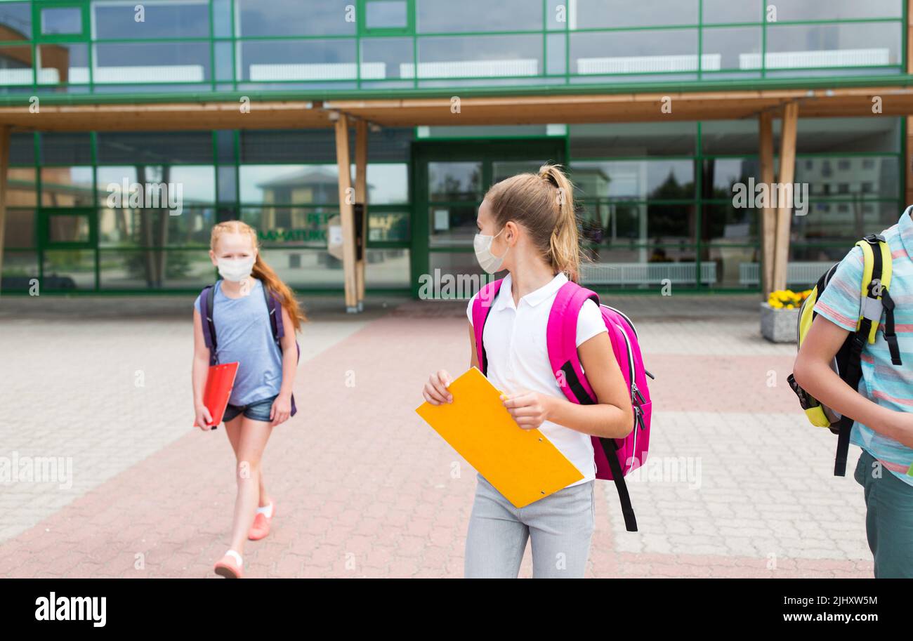 group of elementary school students in masks Stock Photo - Alamy