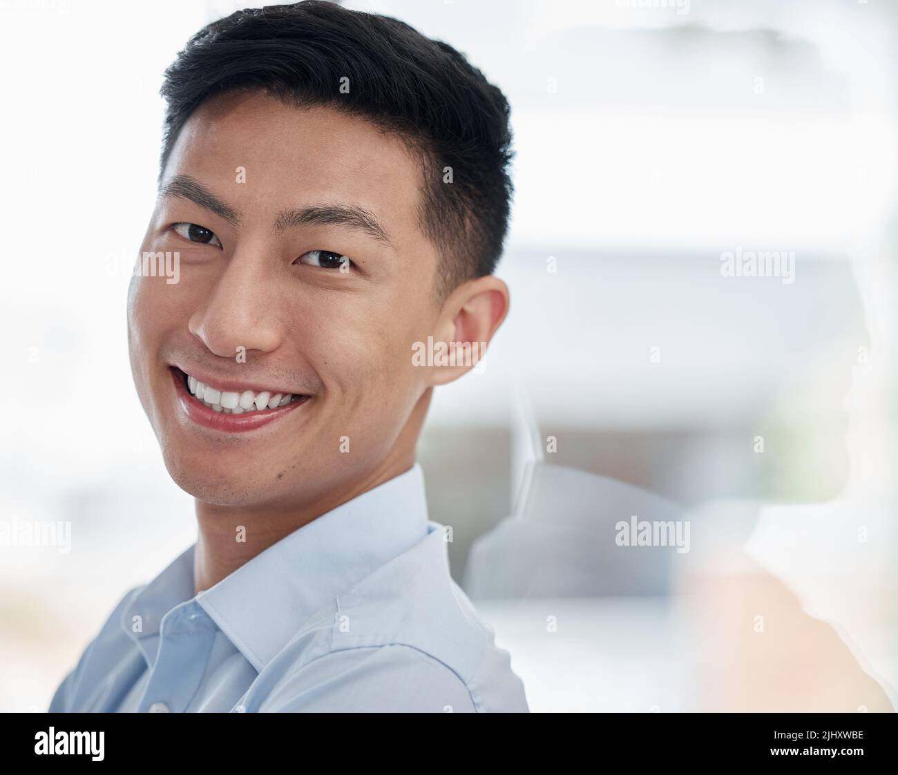 Portrait of one confident young asian business man and leader standing ...