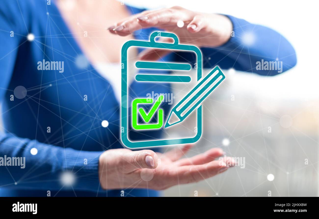 Document validation concept between hands of a woman in background ...