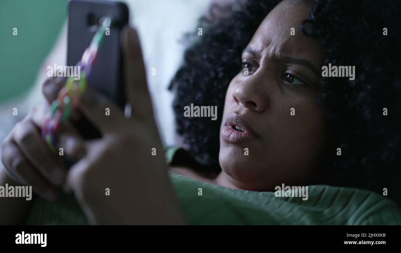 One black woman disbelief emotion reading content online shocking ...