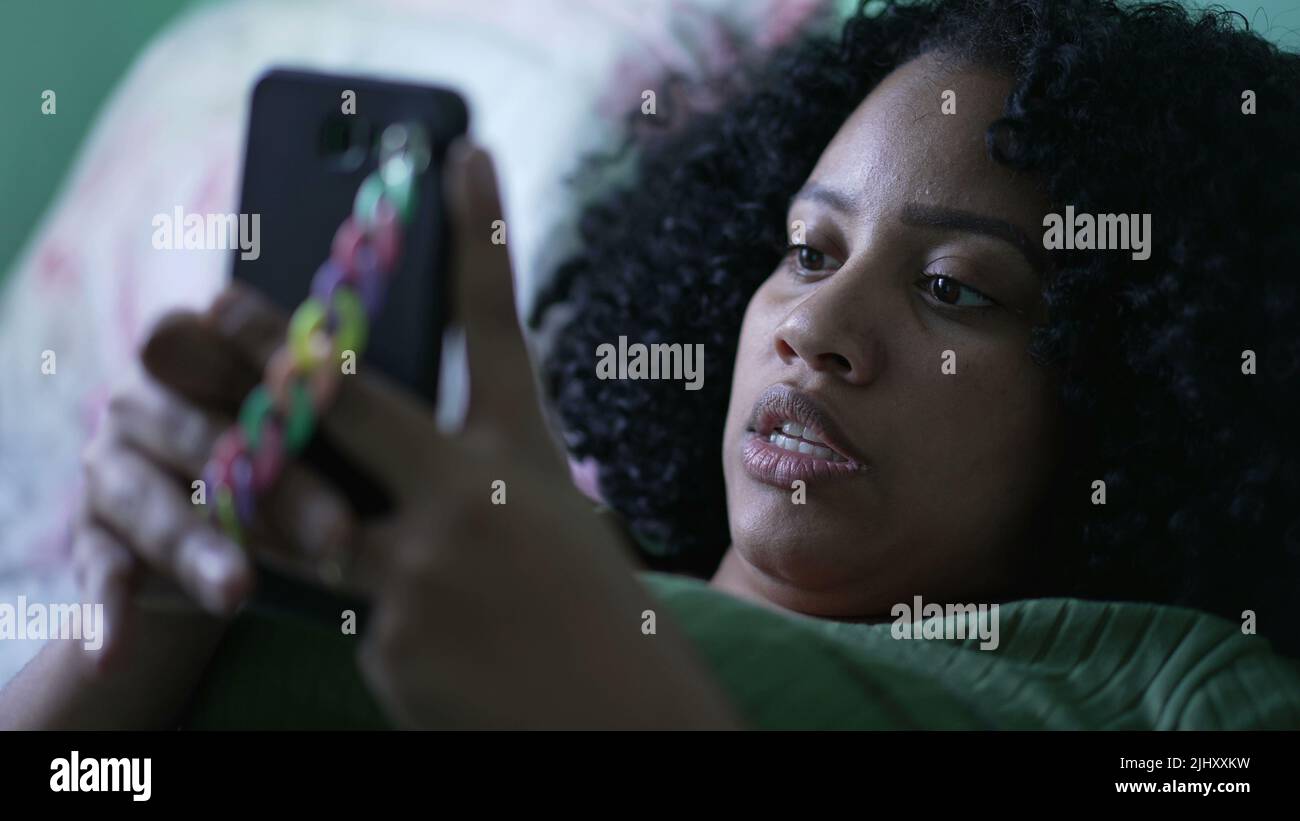 One black woman disbelief emotion reading content online shocking ...