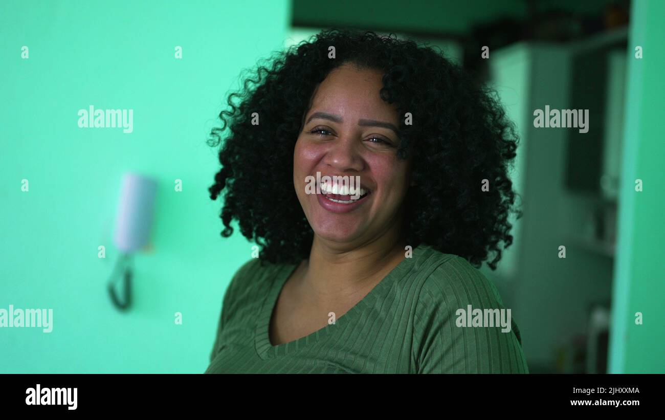 One happy black woman spontaneous laugh and smile Stock Photo - Alamy