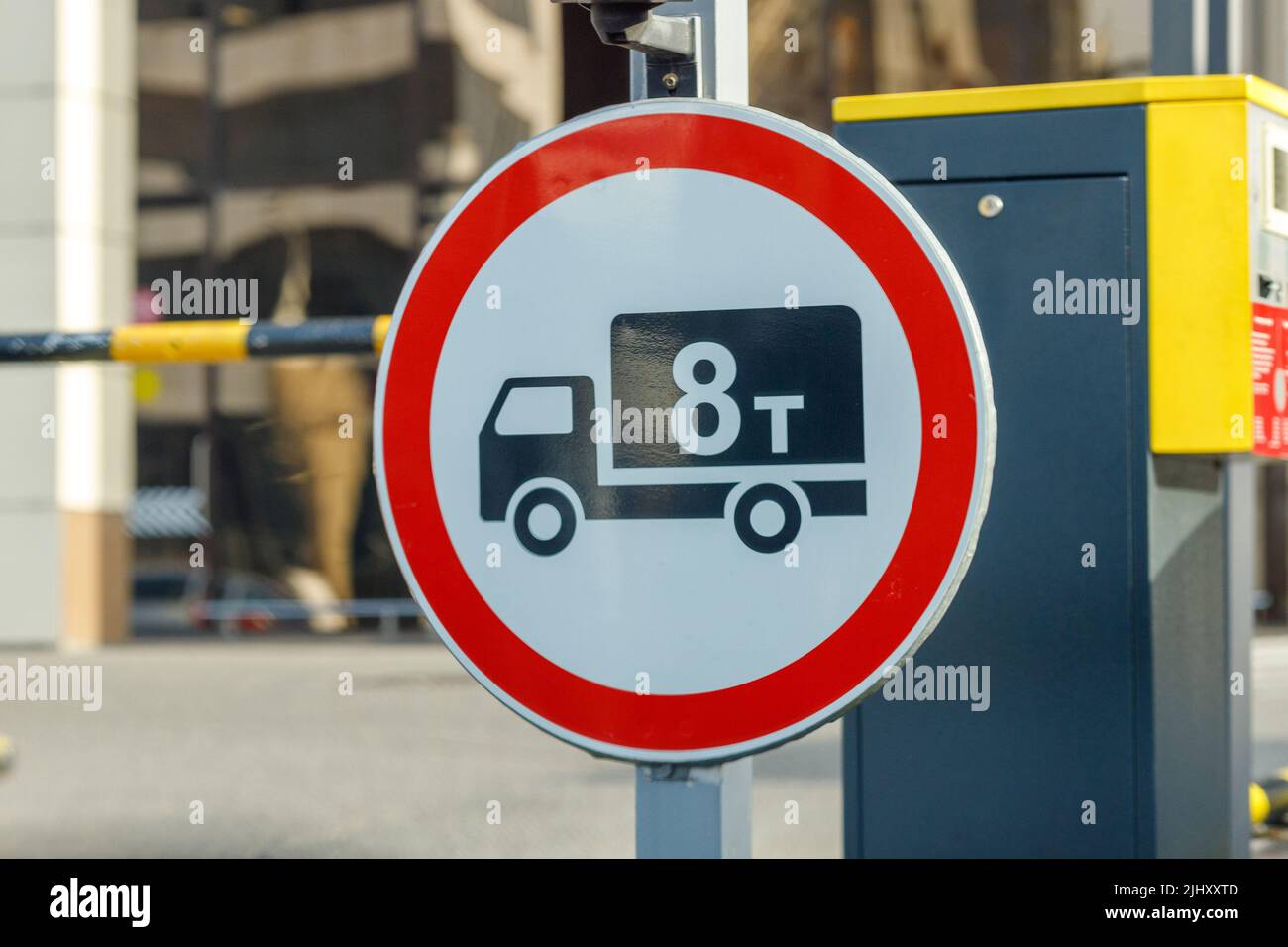 Road sign Weight limit 8t at the barrier at the entrance to the ...