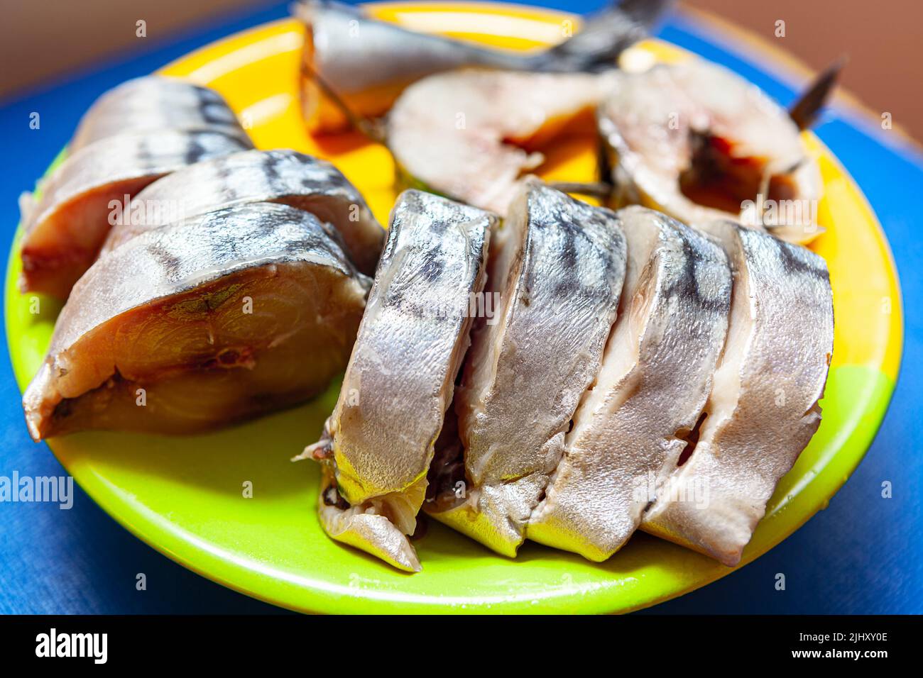 Herring sliced fish . Sliced salted fish fillet Stock Photo - Alamy