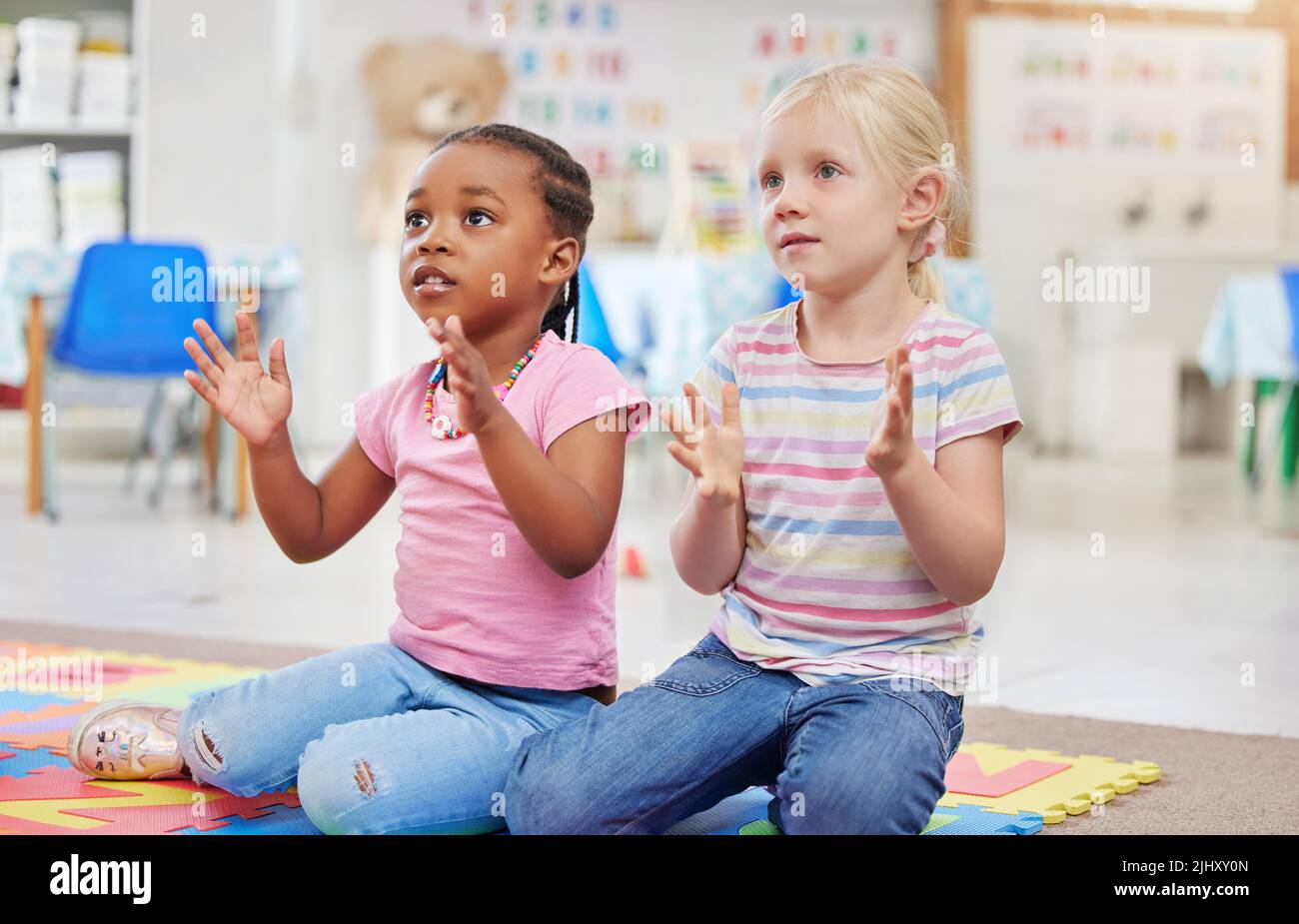 Happy children clapping classroom hi-res stock photography and images ...