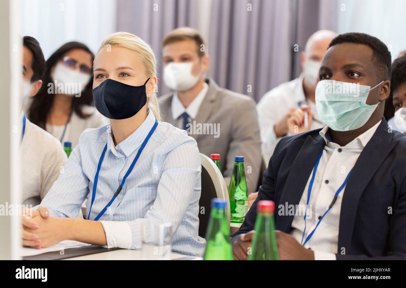 business people in masks at worldwide conference Stock Photo - Alamy