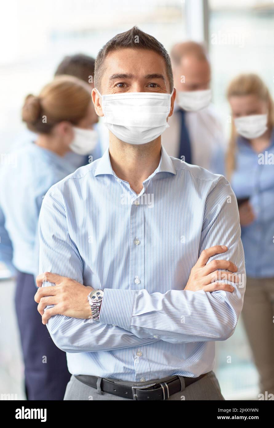 businessman wearing face protective mask at office Stock Photo - Alamy