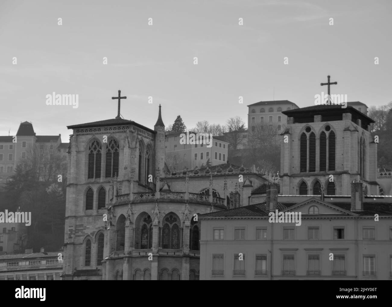 A grayscale exterior shot of the Cathedral Saint-Jean-Baptiste in Lyon ...