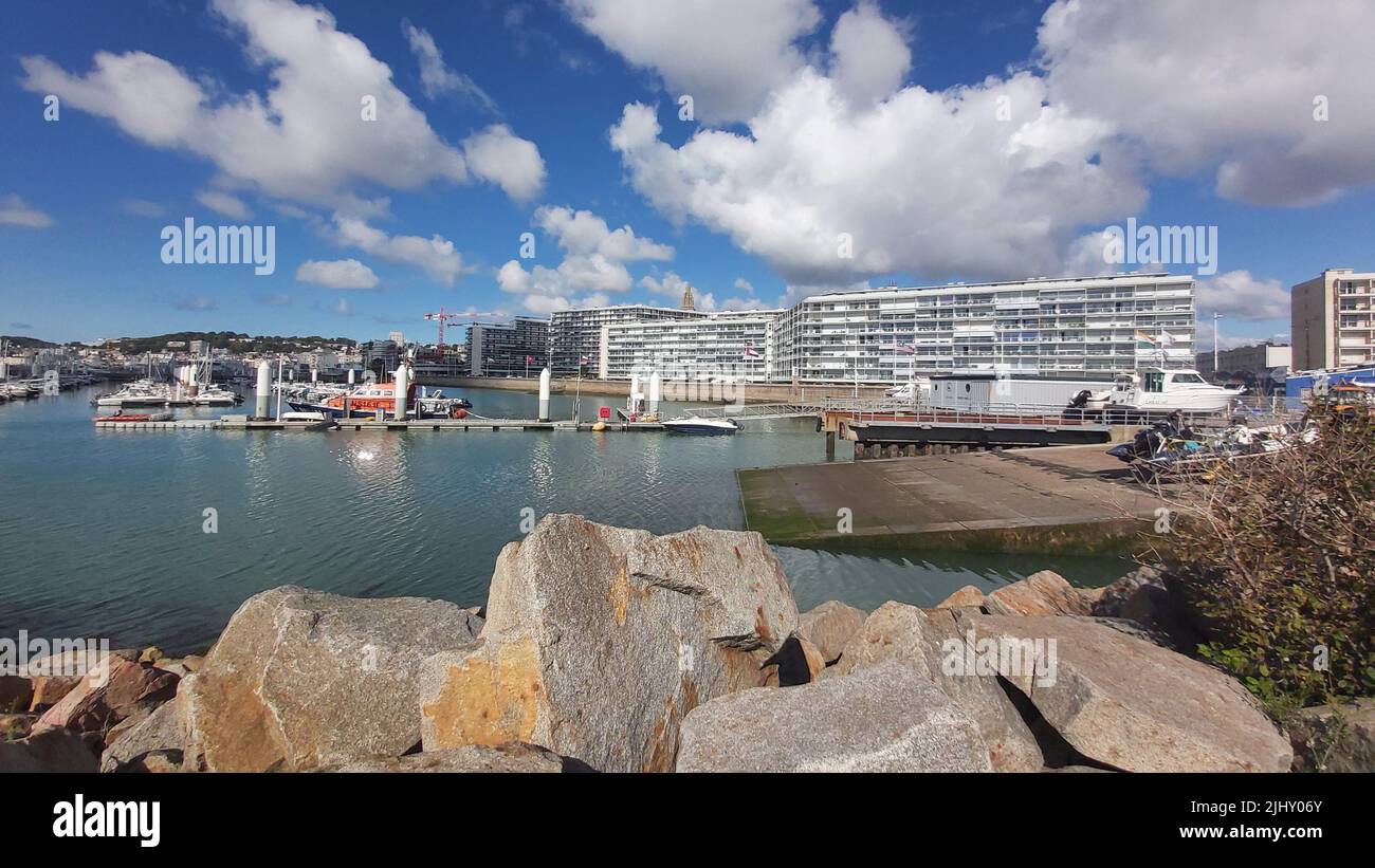 A view of the Old Port of Marseille by the water and buildings under ...