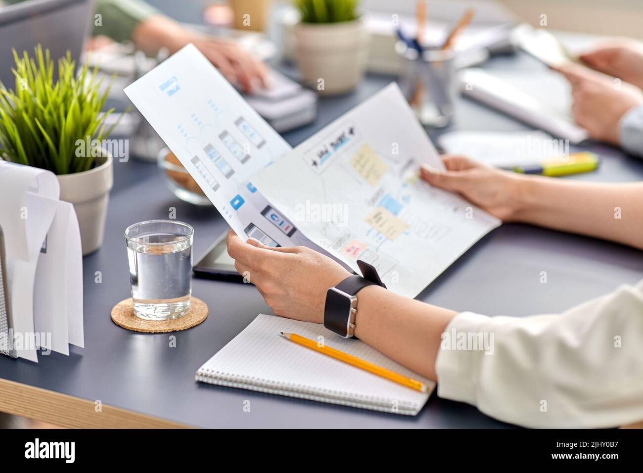 hands with mockup working on ui design at office Stock Photo - Alamy