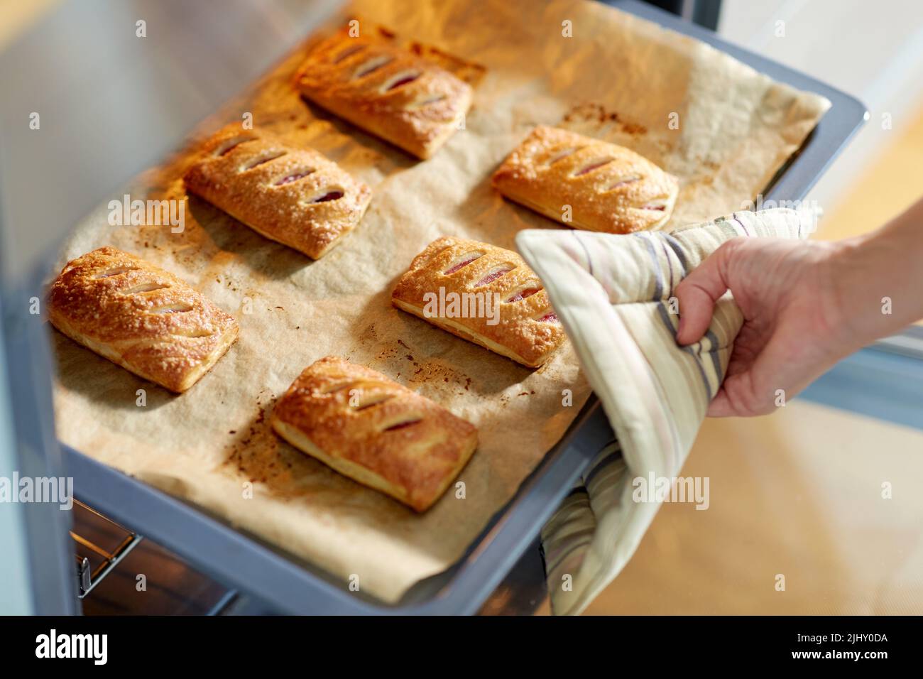 Cooking pie in oven hi-res stock photography and images - Alamy