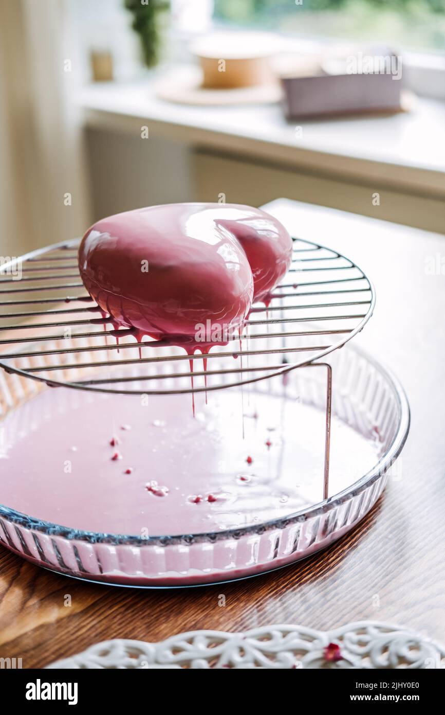 Mousse Cake. Mirror Glaze Cake. Process of making heart shape mousse ...