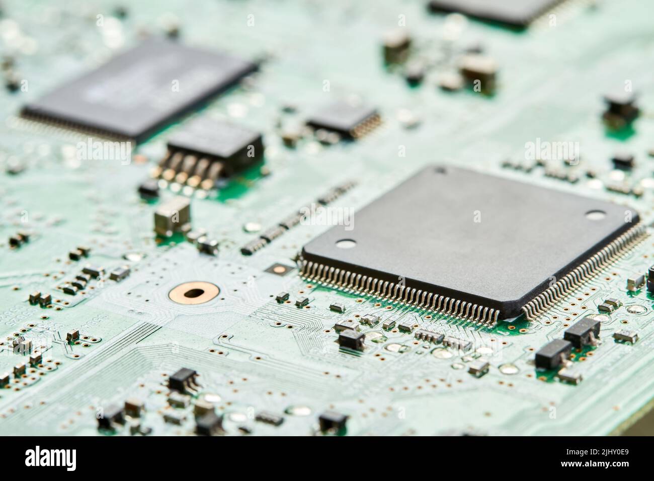 Close-up of computer chip on a part of electronic printed circuit board ...