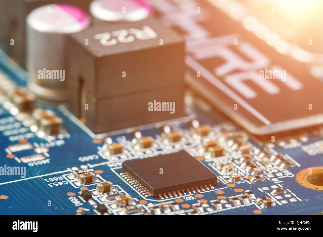 Close-up of computer chip on a Computer graphics card with sunlight ...