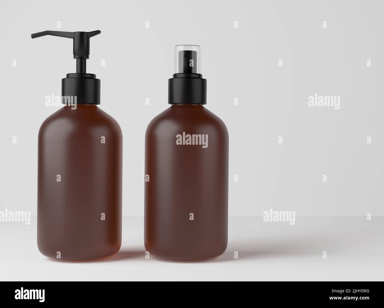 Different amber glass bottles for hair and body care products 3D render ...