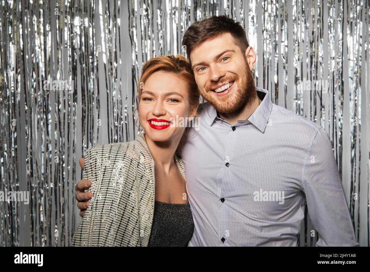 happy hugging couple in party clothes Stock Photo - Alamy