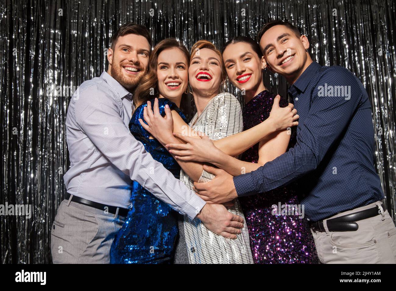 Stylish friends hugging hi-res stock photography and images - Alamy