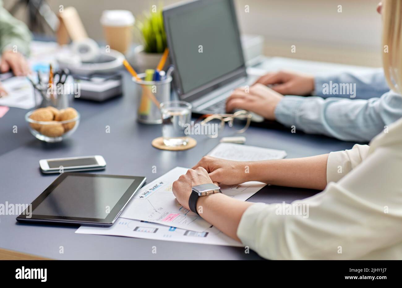hands with mockup working on ui design at office Stock Photo - Alamy
