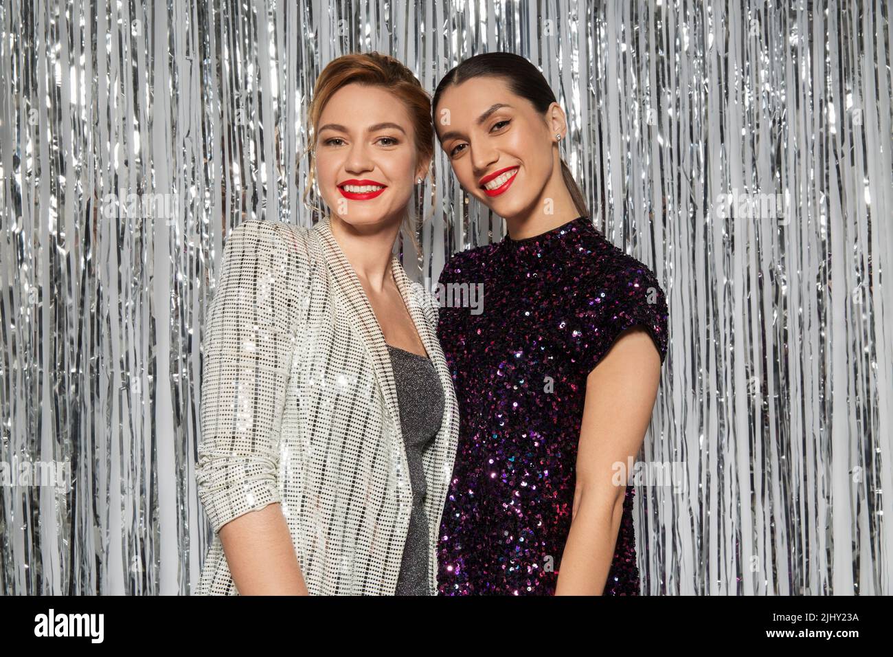 happy women hugging at party Stock Photo - Alamy