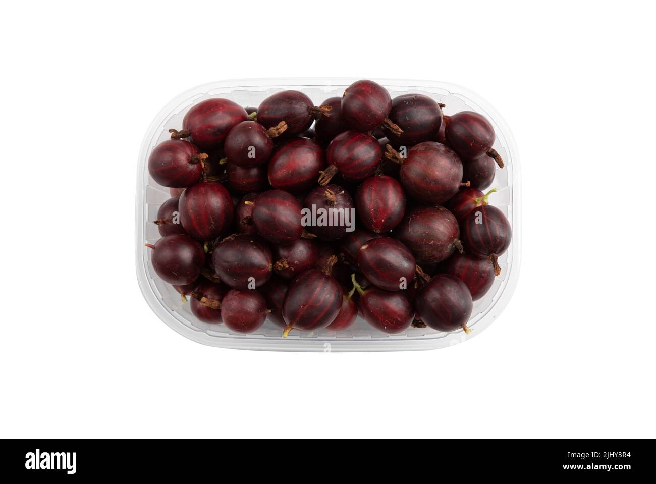 fresh red gooseberry in plastic box container isolated on white ...