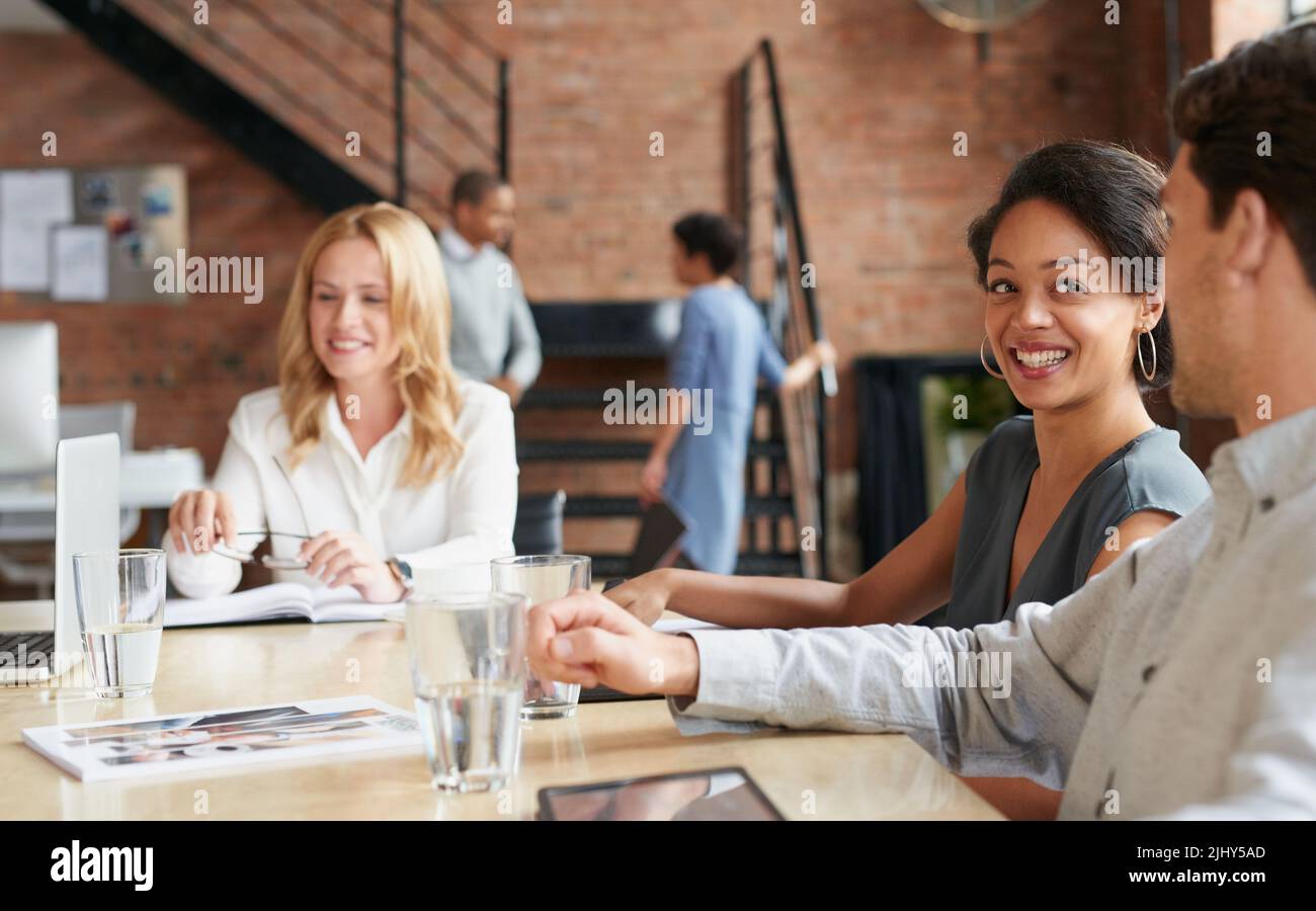 Inspired to keep succeeding together. a young businesswoman having a ...