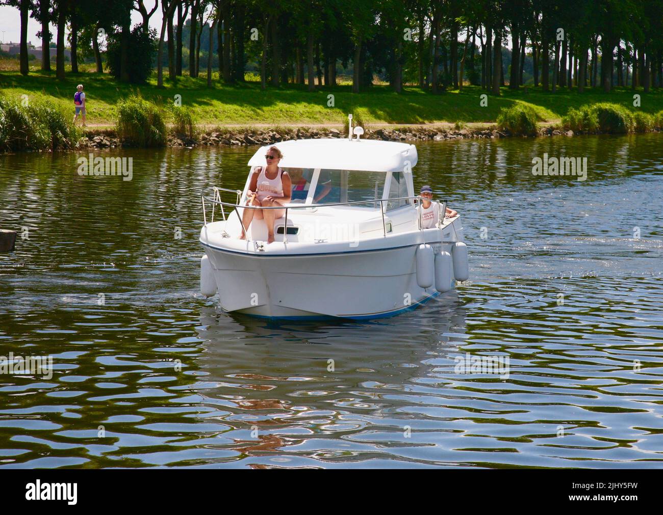 A small pleasure boat in the harbour, Caretan, Normandy, France, Europe ...