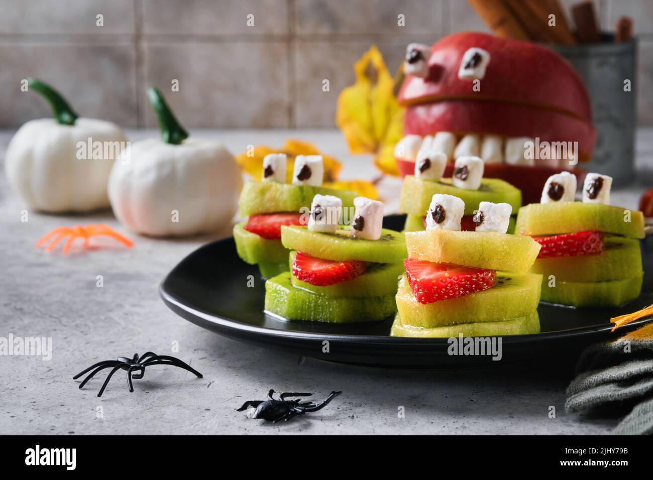 Spooky green kiwi monsters for Halloween. Healthy Fruit Halloween ...