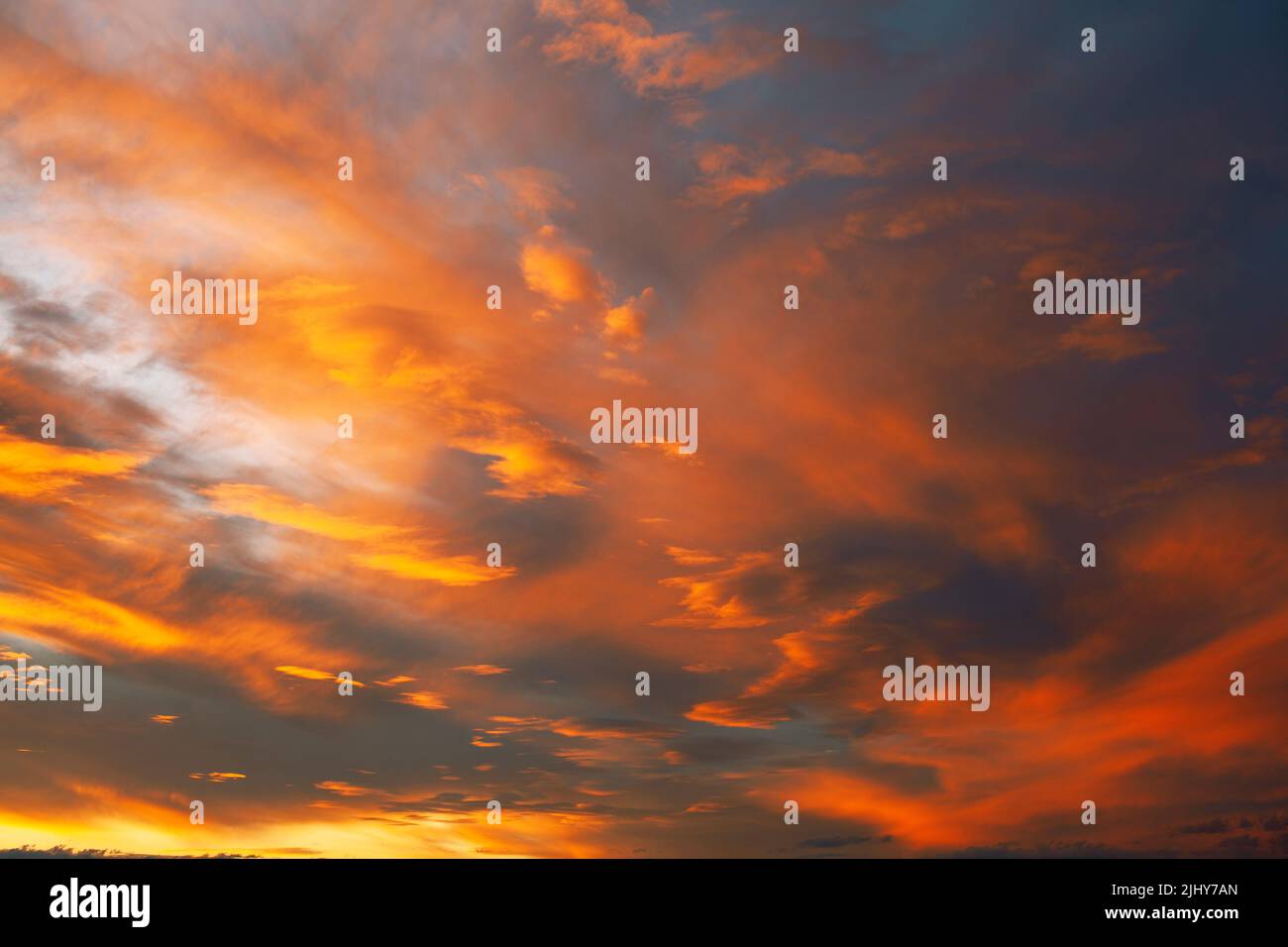 beautiful landscape on sea with sunset, dramatic clouds with red fire ...