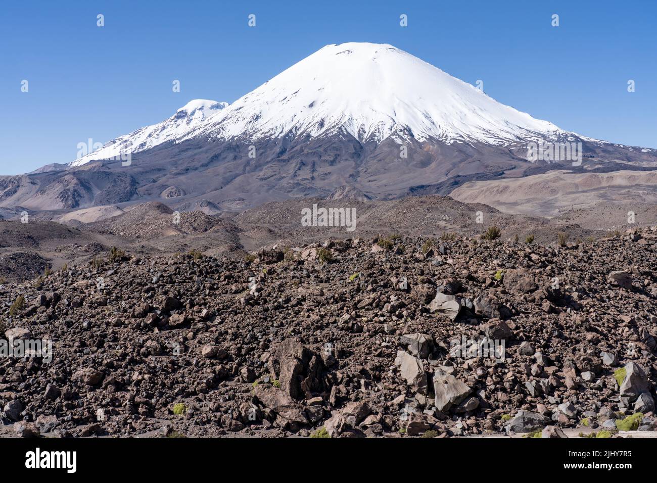 Volcanic debris from the Parinacota (front) and Pomerape Volcanos, the ...