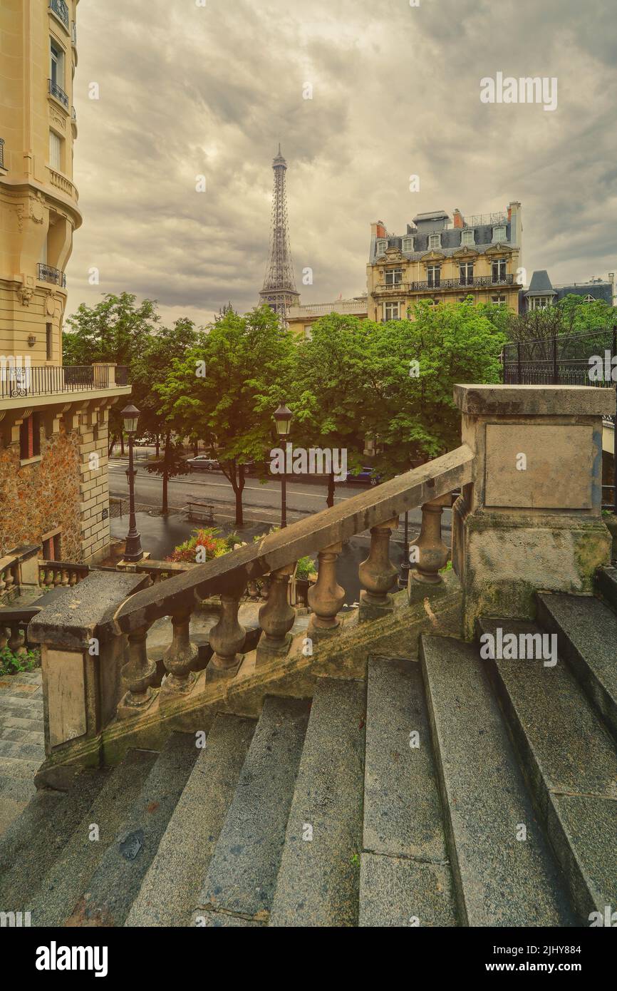 View of Eiffel Tower on street in Paris. Eiffel Tower is an ...