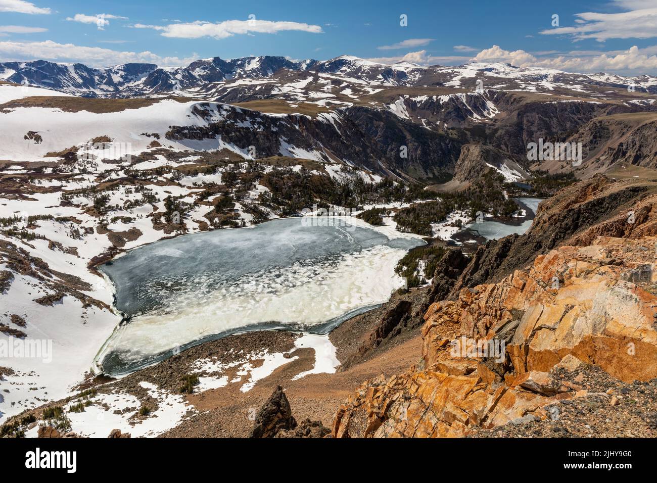 Melting Twin Lakes in late spring along the Beartooth Highway, Shoshone ...