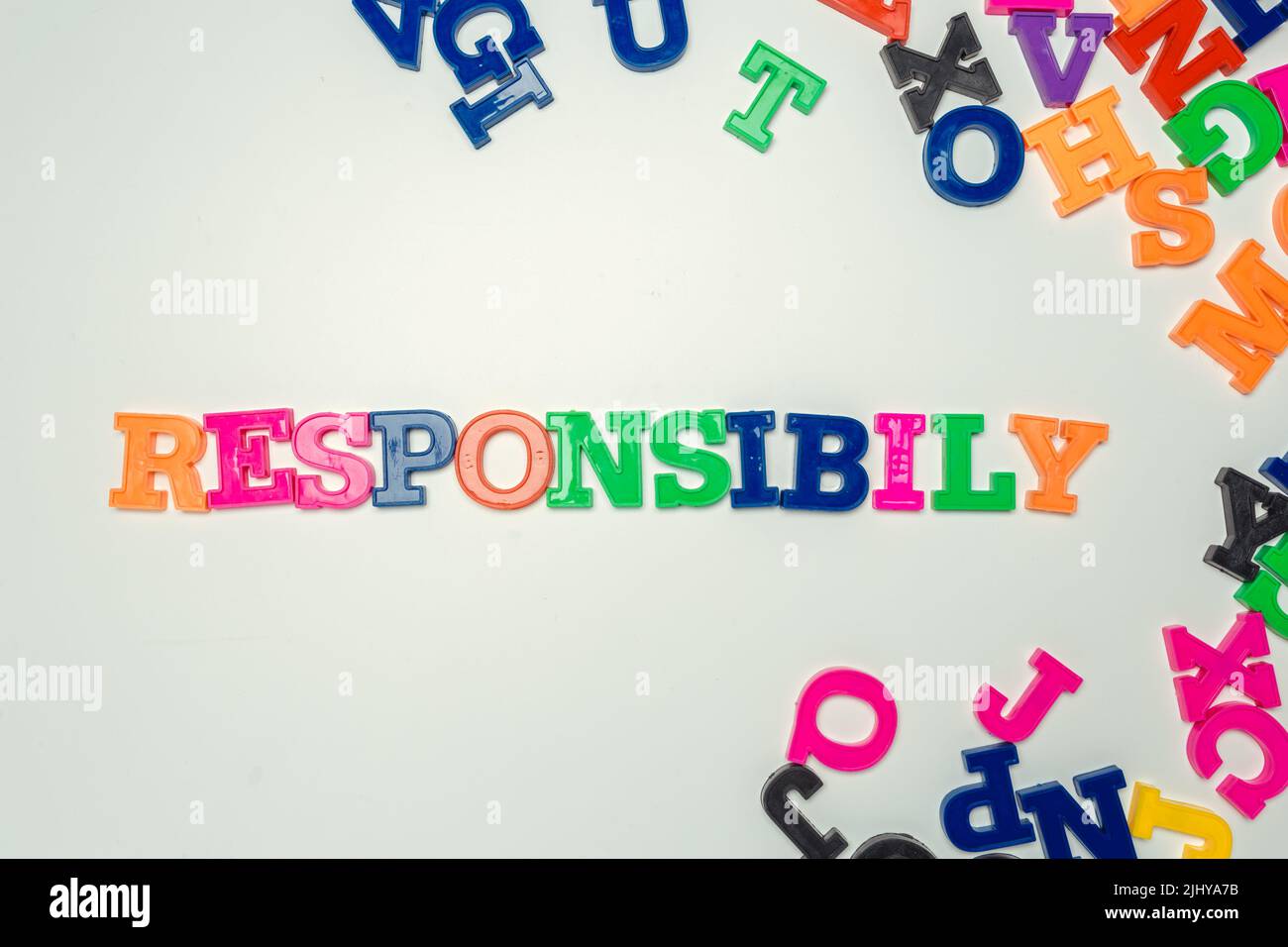Responsibility word made from colorful plastic letters on white ...